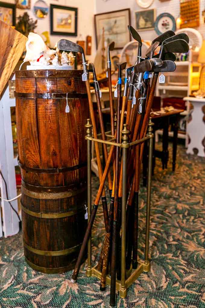 Wooden walking sticks stand ready like a gentleman's arsenal, each one fancier than anything you'd find at CVS.