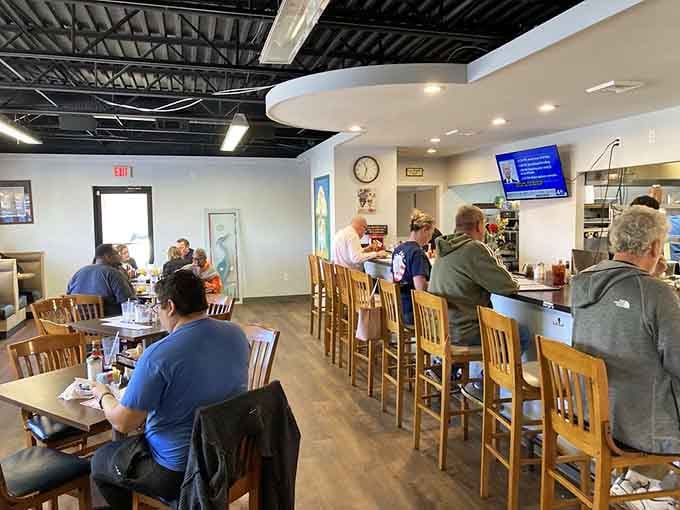A dining room where strangers become neighbors and everyone's connected by the universal language of "pass the syrup, please."
