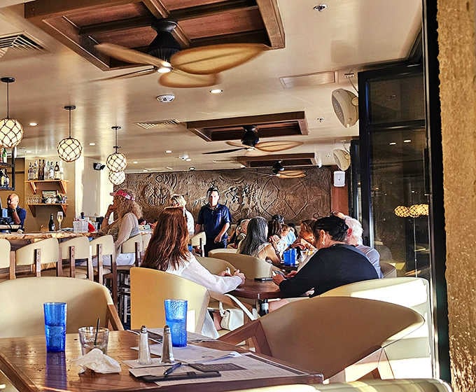 Where conversations flow as smoothly as the cocktails. The perfect blend of locals and visitors creates that authentic Hawaiian dining atmosphere you've been searching for.