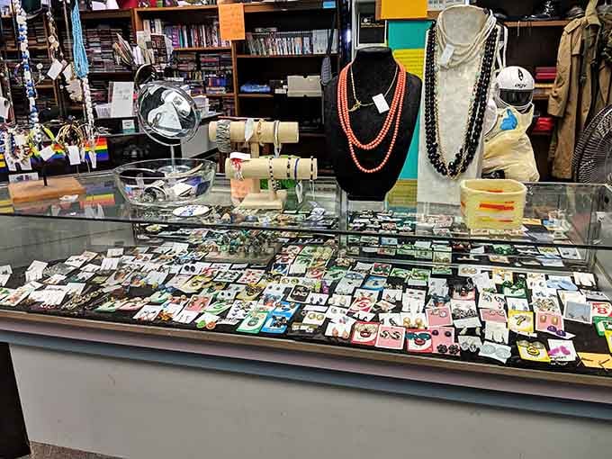 The jewelry case gleams with possibilities, from costume pieces to hidden gems waiting for someone to recognize them.