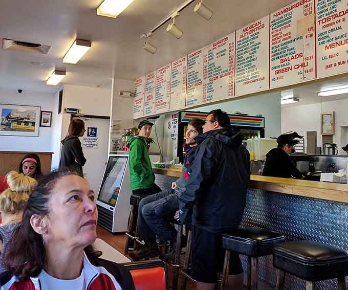The lunch rush brings everyone together at the counter, united in their quest for the best Mexican food around.