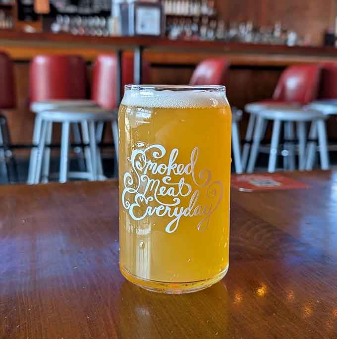"Smoked Meat Everyday" on the glass says it all, really, and that golden beer looks ready to help the cause.