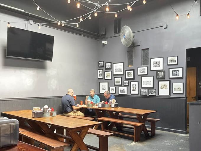 Long communal tables where strangers become friends over shared appreciation for perfectly smoked proteins and good conversation.