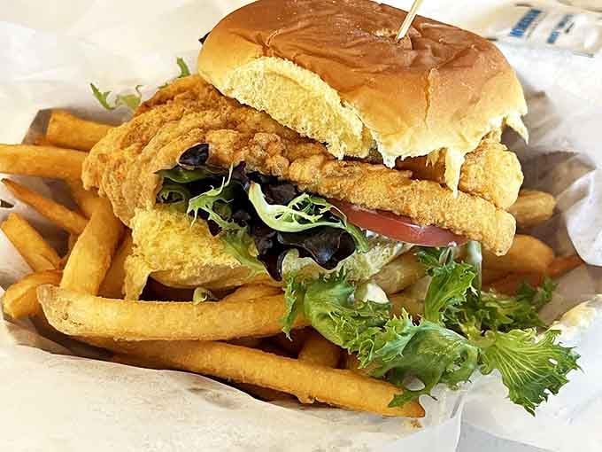 The fish sandwich that makes fast food versions hide in shame. Fresh haddock, crispy coating, garden-fresh toppings, and fries that didn't come from a freezer.