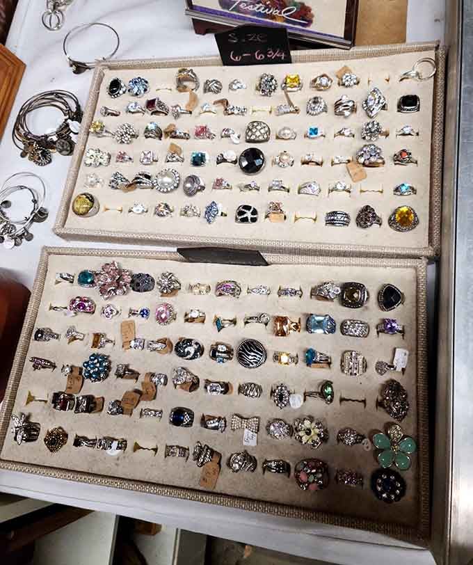 Vintage rings displayed like tiny works of art, each one carrying decades of stories, proposals, and maybe some drama.