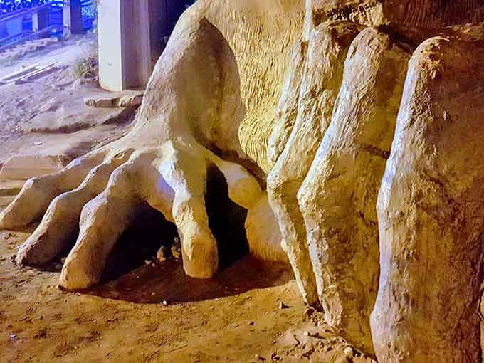 Those fingers could palm a basketball team, but they're too busy crushing this unfortunate Volkswagen for eternity.