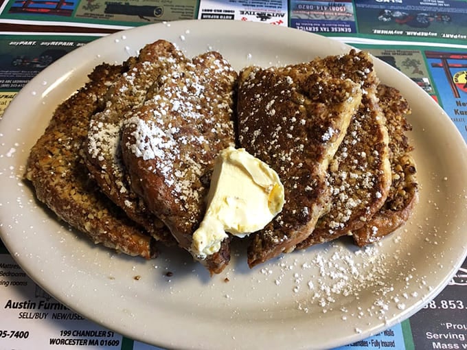 French toast that's dressed for success with powdered sugar snow and a butter hat&mdash;breakfast elegance that doesn't require a reservation.