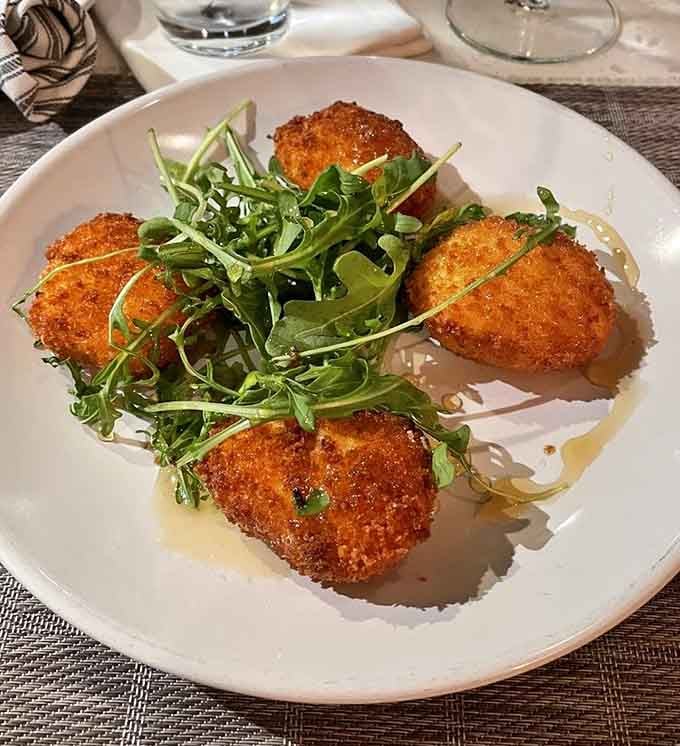 Crispy on the outside, warm and creamy within—these fried goat cheese medallions are what clouds must taste like to angels.