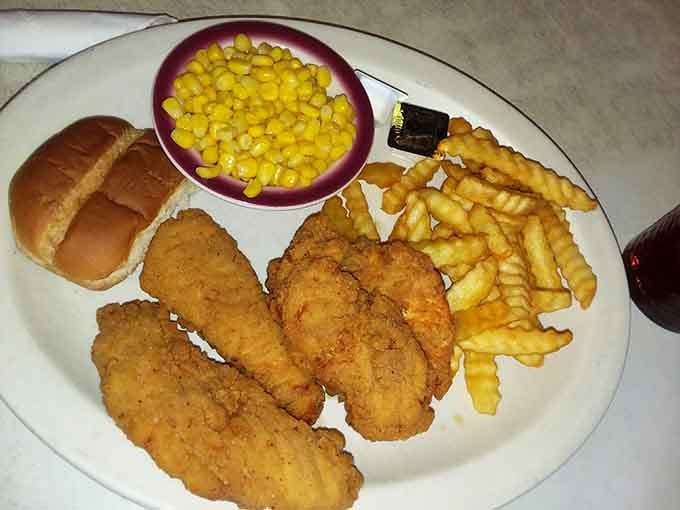 Chicken tenders, fries, and corn that somehow constitute breakfast because diners make their own delicious rules here.