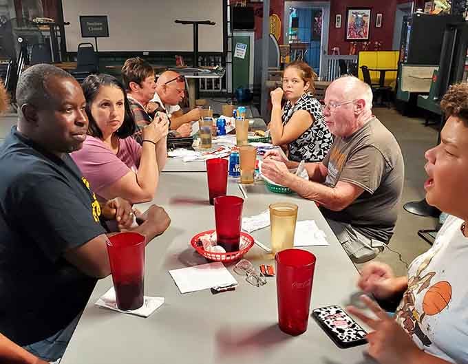 Families gather around tables where Star Wars fandom meets genuine Texas hospitality in perfect harmony every day.