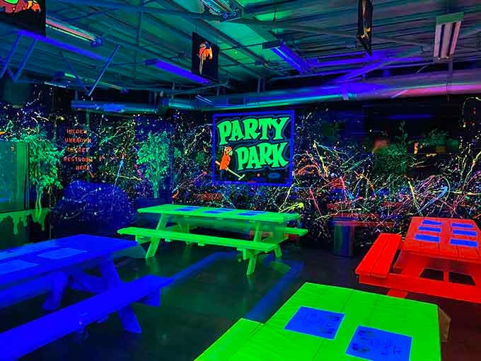 The Party Park seating area glows invitingly, perfect for celebrating victories or consoling those who lost to a ten-year-old.