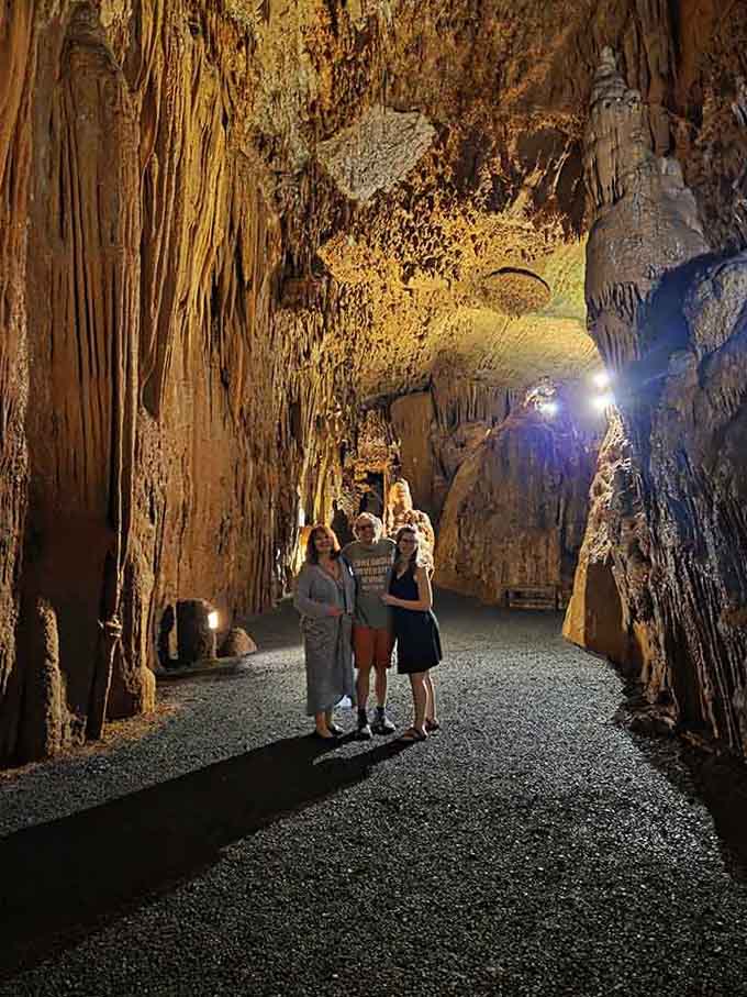 Tour groups gather beneath towering formations, their faces lit with wonder at what's been hiding beneath Virginia all along.