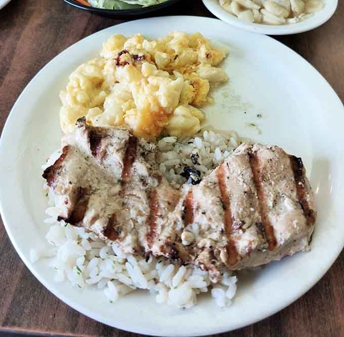 Grilled chicken over rice with mac and cheese&mdash;for when you want to pretend you're making healthy choices while still living your best life.