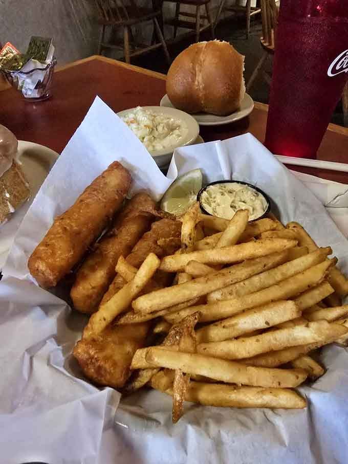Golden fish and chips with a mountain of fries prove this diner does lunch just as well.