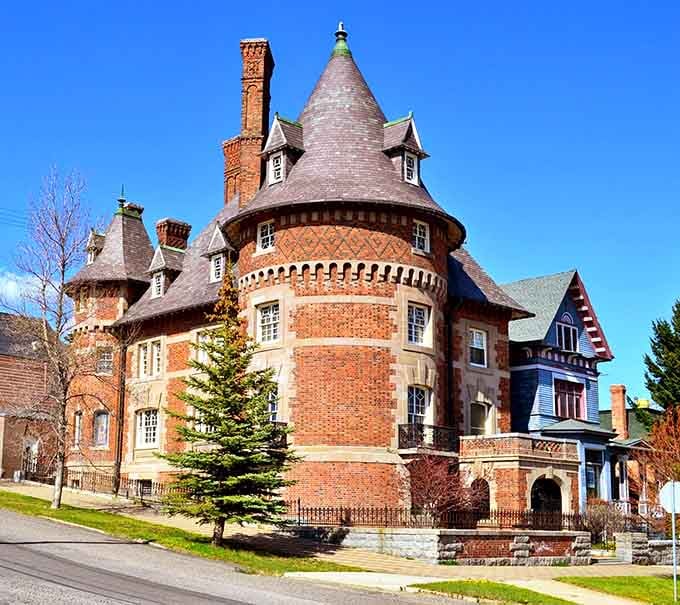 The Clark Chateau looks like it was plucked from a European countryside and dropped into Montana. Its fairytale turret whispers stories of copper barons and Gilded Age excess.
