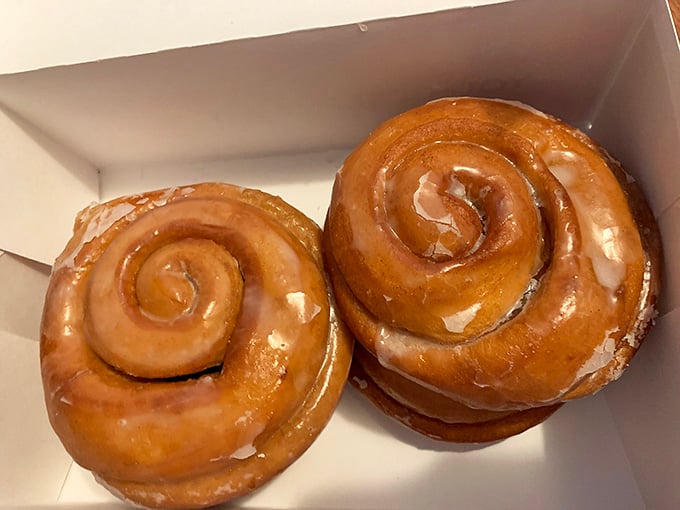 Cinnamon rolls spiraling into sweet oblivion, glazed and ready to justify that extra gym session later.