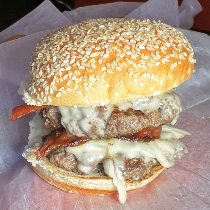 Two patties, melted cheese, and bacon&mdash;a tower of power that requires both hands and absolutely no shame.