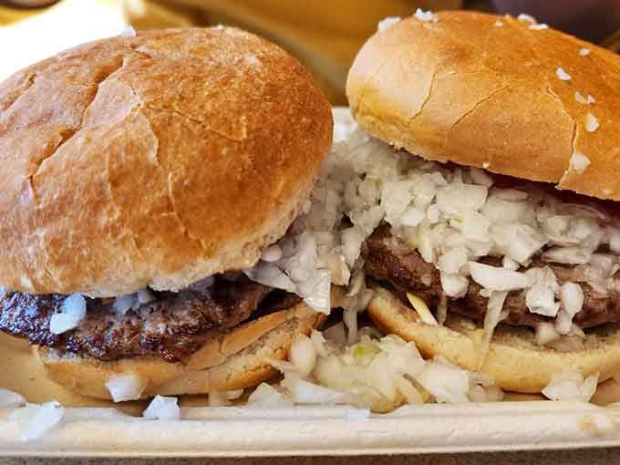 Burgers topped with enough onions to keep vampires away for weeks, possibly also your coworkers tomorrow.