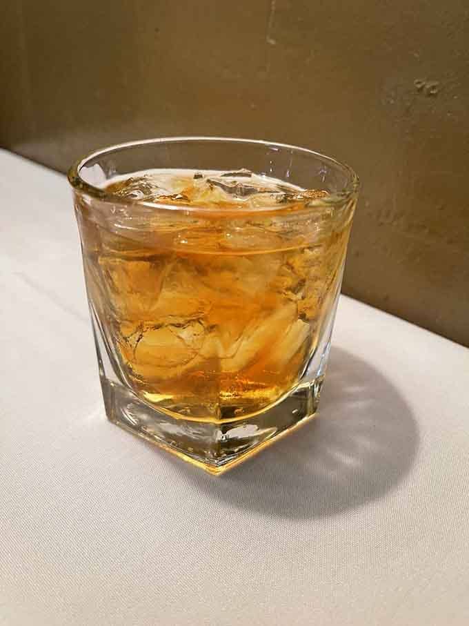 Woodford Reserve on ice in a proper glass, because some things don't need improvement, just appreciation and good company.
