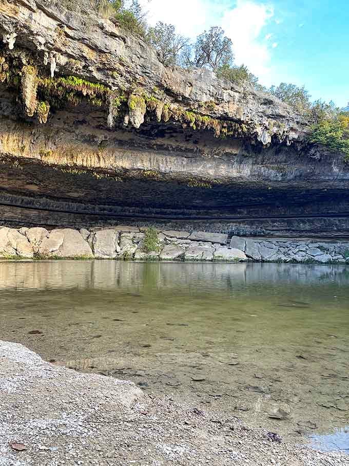Limestone ledges frame water that looks like it belongs in a travel magazine, not your own backyard state.