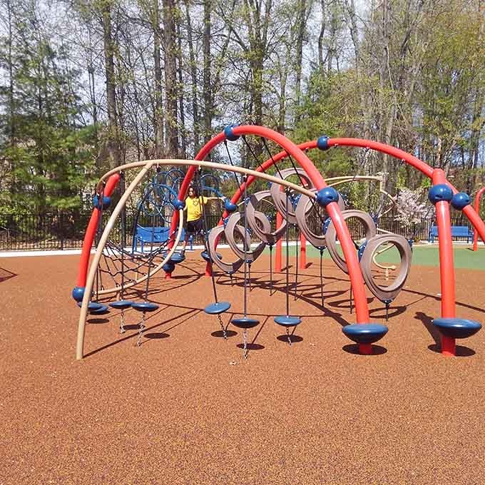 This colorful climbing dome challenges coordination while looking like a modern art installation came to life.