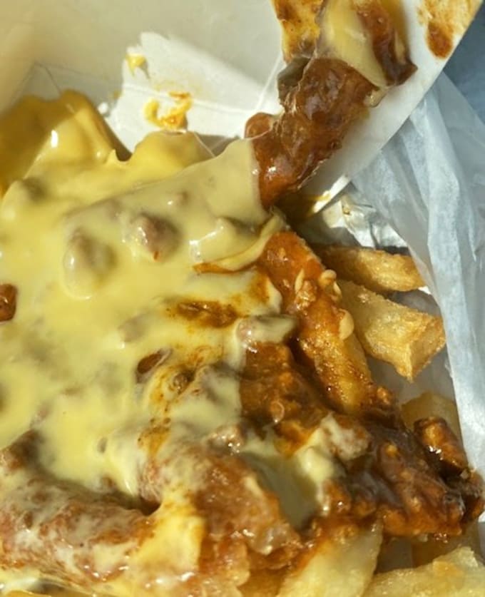 Chili cheese fries that laugh in the face of portion control and make absolutely no apologies for it.