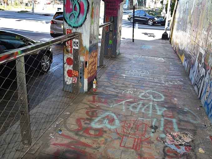 The walkway stretches ahead like a rainbow tunnel, inviting you to slow down and appreciate every colorful detail.
