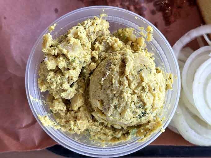 Creamy potato salad that's the perfect cool counterpoint to hot-off-the-smoker barbecue, simple and satisfying every time.