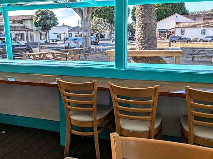 Window seating lets you watch the world go by while contemplating your next order, priorities sorted.