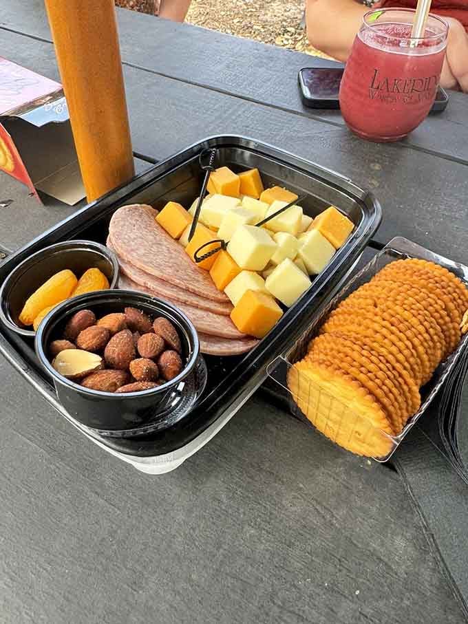 Cheese, crackers, and nuts arranged perfectly because even casual wine country snacking deserves a little presentation and a lot of flavor.