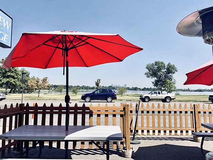 Outdoor seating with red umbrellas offers the closest thing to a lake view you'll find here, ironically.