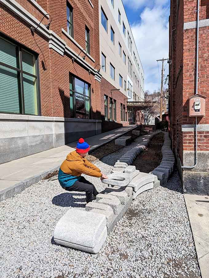 This granite installation showcases Barre's artisans at work, transforming cold stone into functional art that connects past craftsmanship with present innovation.