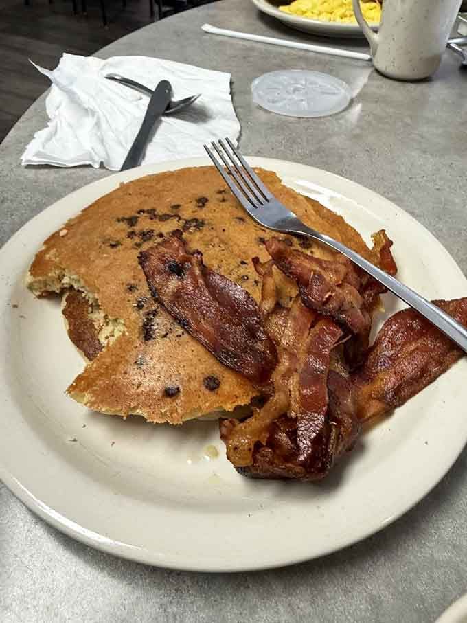 Chocolate chip pancakes with bacon so crispy it could double as a musical instrument if you were so inclined.