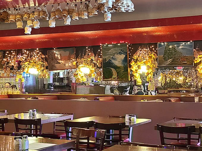 The dining room stretches out with red booths and tables, ready to host your next celebration or Tuesday.