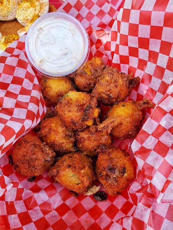 Golden hush puppies fried to crispy perfection make you understand why the South won the culinary war, friends.