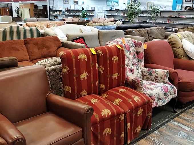 A sea of couches in every style from floral grandma-chic to solid neutrals, because everyone's comfort preference deserves representation here.