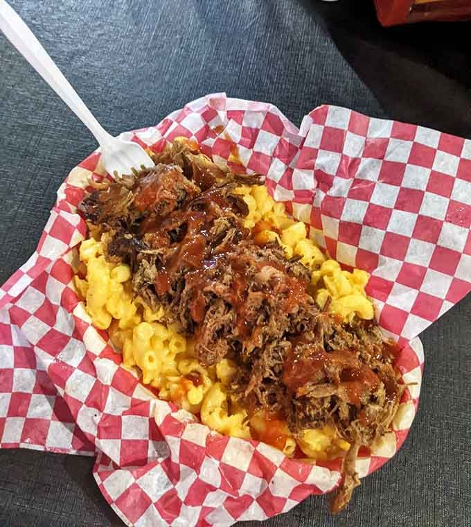 Mac and cheese topped with pulled pork—because sometimes good things need to sit on top of other good things to become great things.