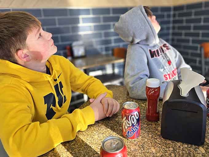 Young fans fueling up on sandwiches and school spirit, creating memories that'll last longer than their college years combined.