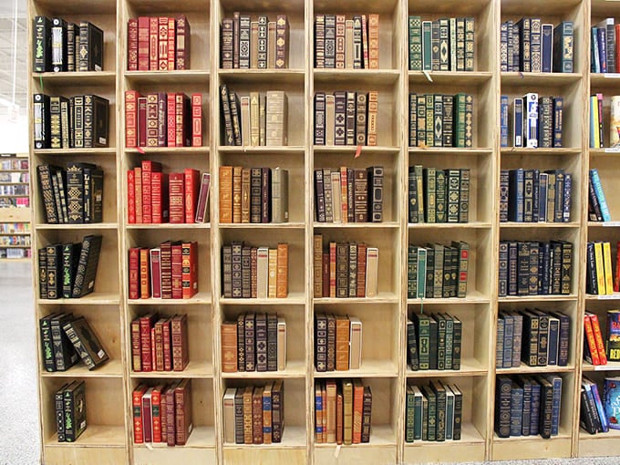 Color-coordinated books create a rainbow effect that's both aesthetically pleasing and surprisingly helpful for browsing purposes efficiently.