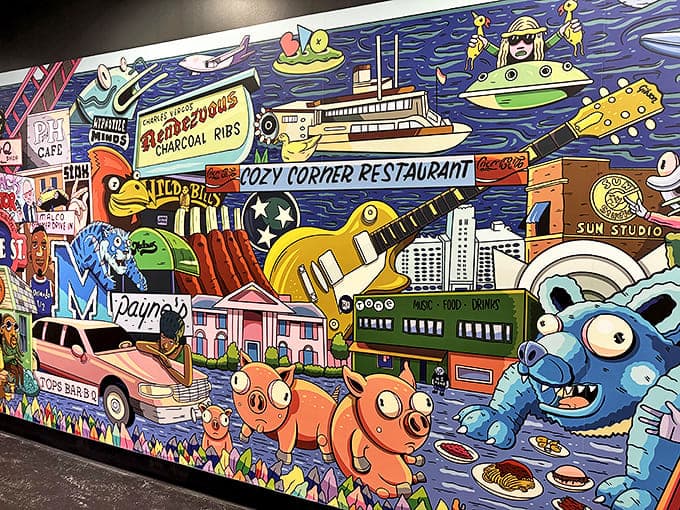 This vibrant mural captures Memphis barbecue culture with the psychedelic energy of a meat-induced dream. Cartoon pigs never looked so happily doomed.