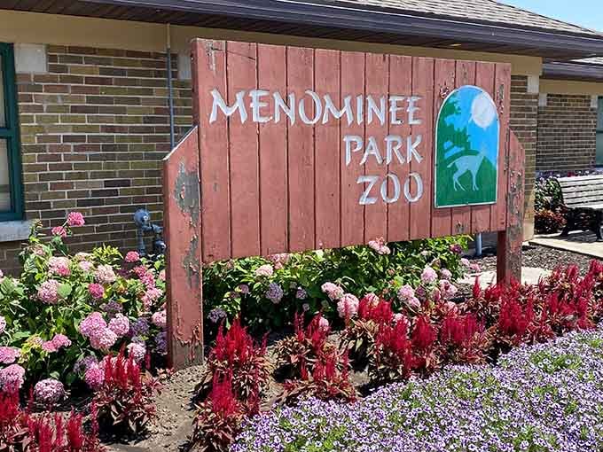 Menominee Park Zoo's charming entrance sign promises family fun without the overwhelming crowds or second mortgage required by larger zoos.