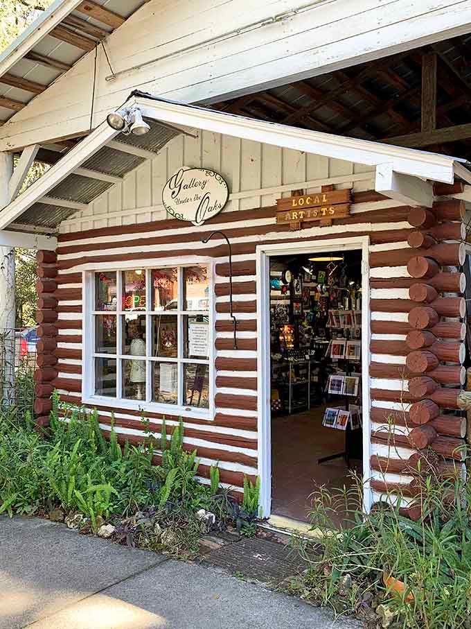 Gallery Under the Oaks showcases local artists in a log cabin that's more authentic than anything Disney built.