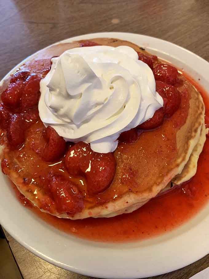 Strawberries and whipped cream turn pancakes into celebration food, because why wait for special occasions?