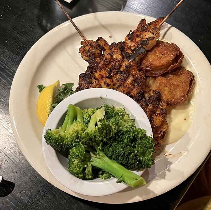 Cajun shrimp with fried green tomatoes proving this kitchen has more tricks up its sleeve than a magician's convention.