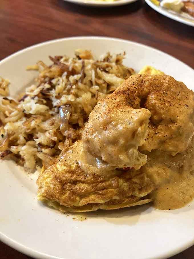 Biscuits and gravy meeting eggs in the most beautiful breakfast romance since bacon met everything else on earth.