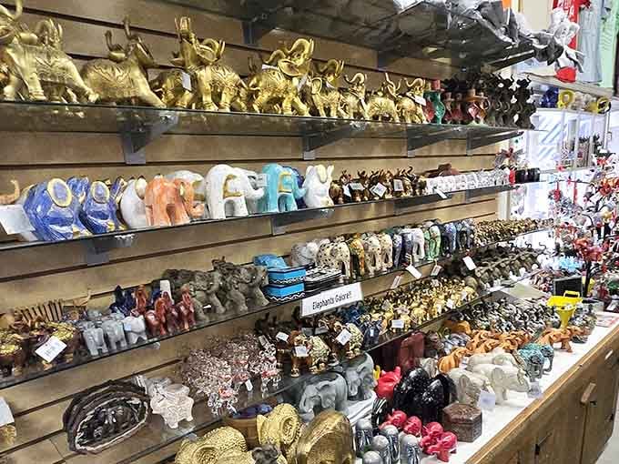Golden elephant figurines march in formation, their trunks raised high in the traditional symbol of good fortune and prosperity.