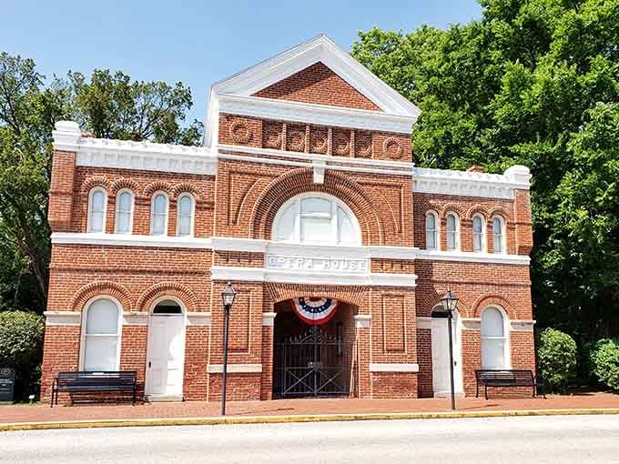 The Opera House's ornate brickwork and patriotic bunting celebrate small-town culture that refuses to fade away.