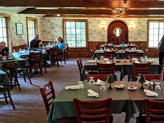 Stone walls and wooden beams frame this dining room where countless celebrations and Tuesday night dinners have unfolded beautifully.