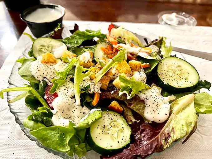 Even the salads here look like they're trying to impress, fresh and colorful as a summer garden.