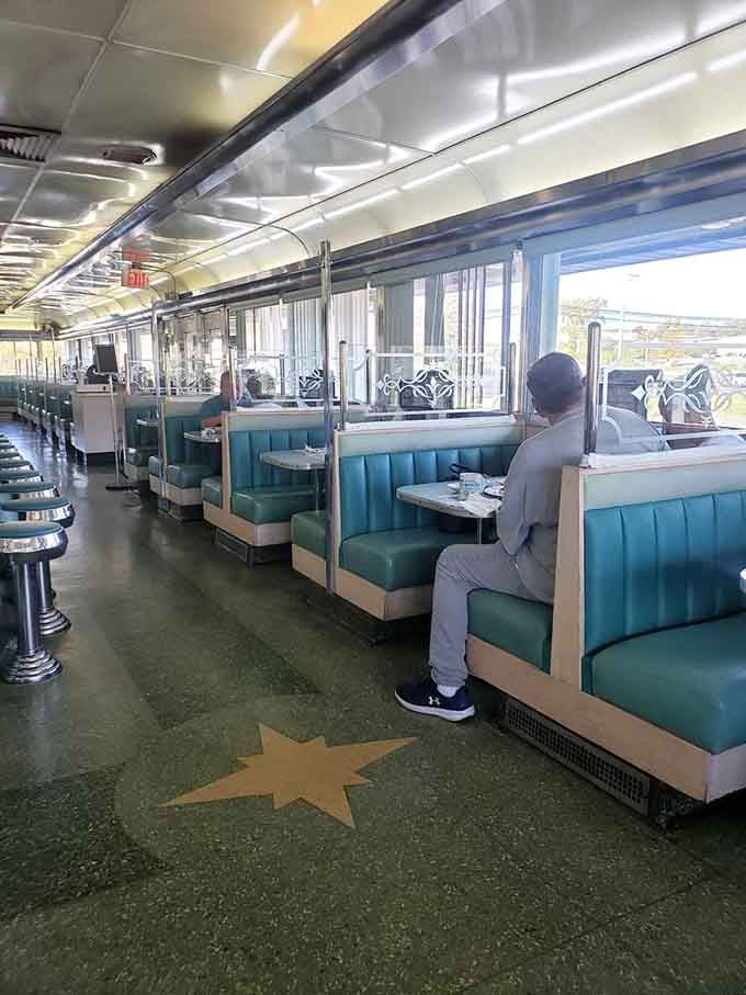 Those turquoise booths have absorbed more conversations, confessions, and life decisions than any therapist's office in Connecticut.